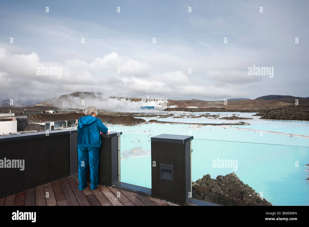 Women standing looking at view Stock Photo - Alamy