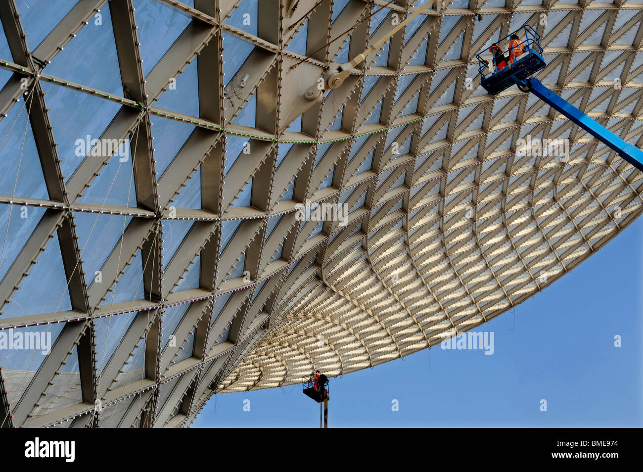 Workers working on construction lift, Sun Valley, Expo Axis, 2010 ...