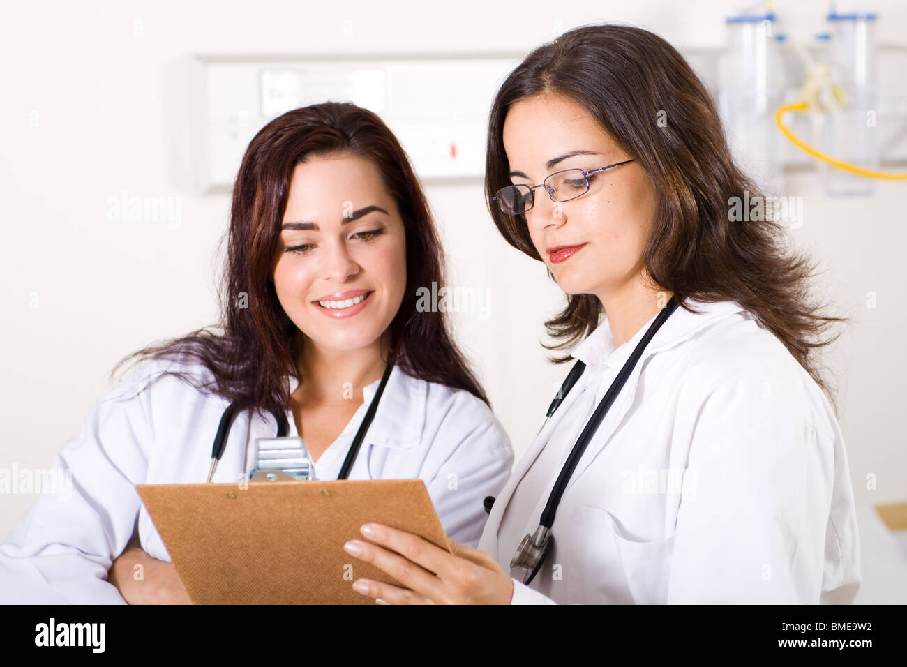 two female doctors working in hospital Stock Photo - Alamy