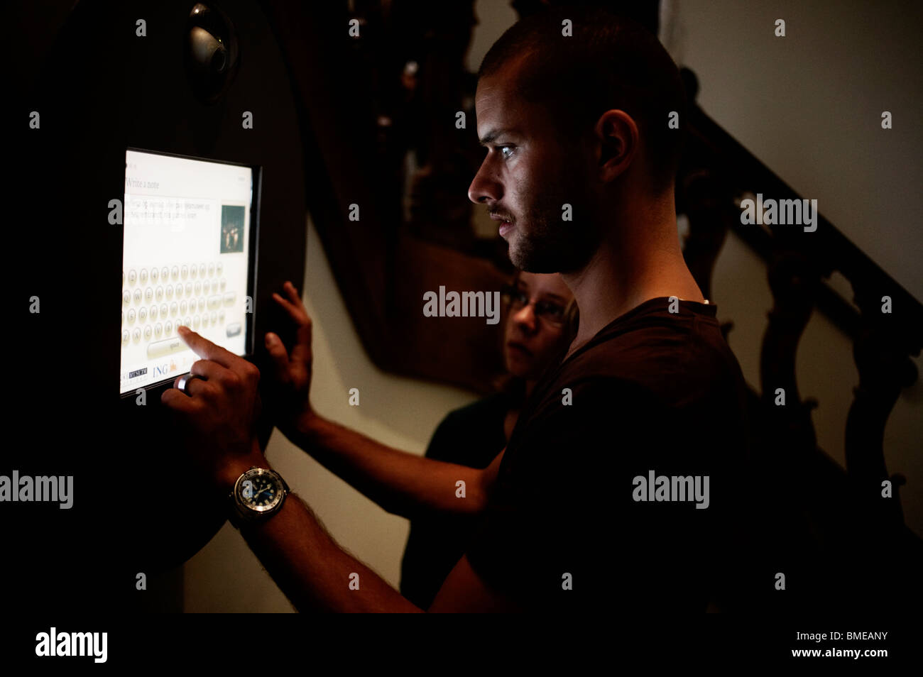 Man using touch screen computer Stock Photo - Alamy