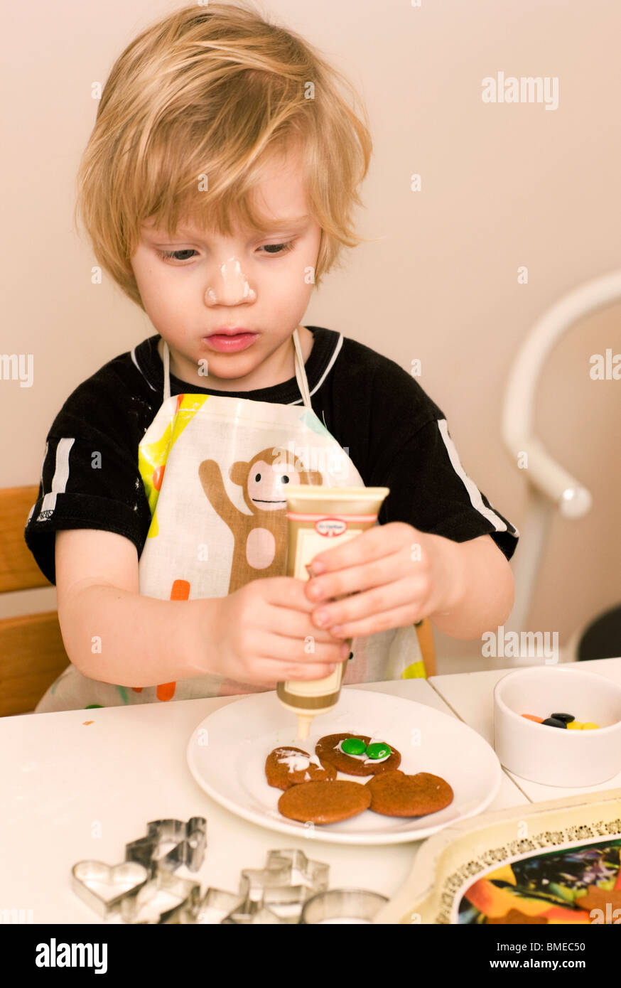 Boy preparing cookies Stock Photo - Alamy