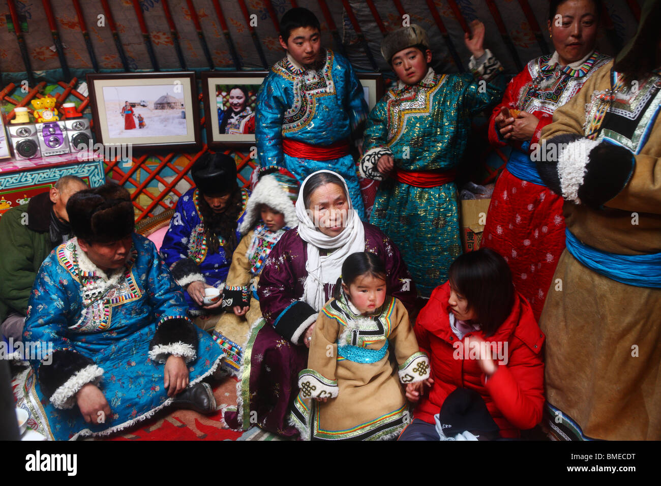 Mongolian family in yurt, Hulunbuir, Inner Mongolia Autonomous Region ...