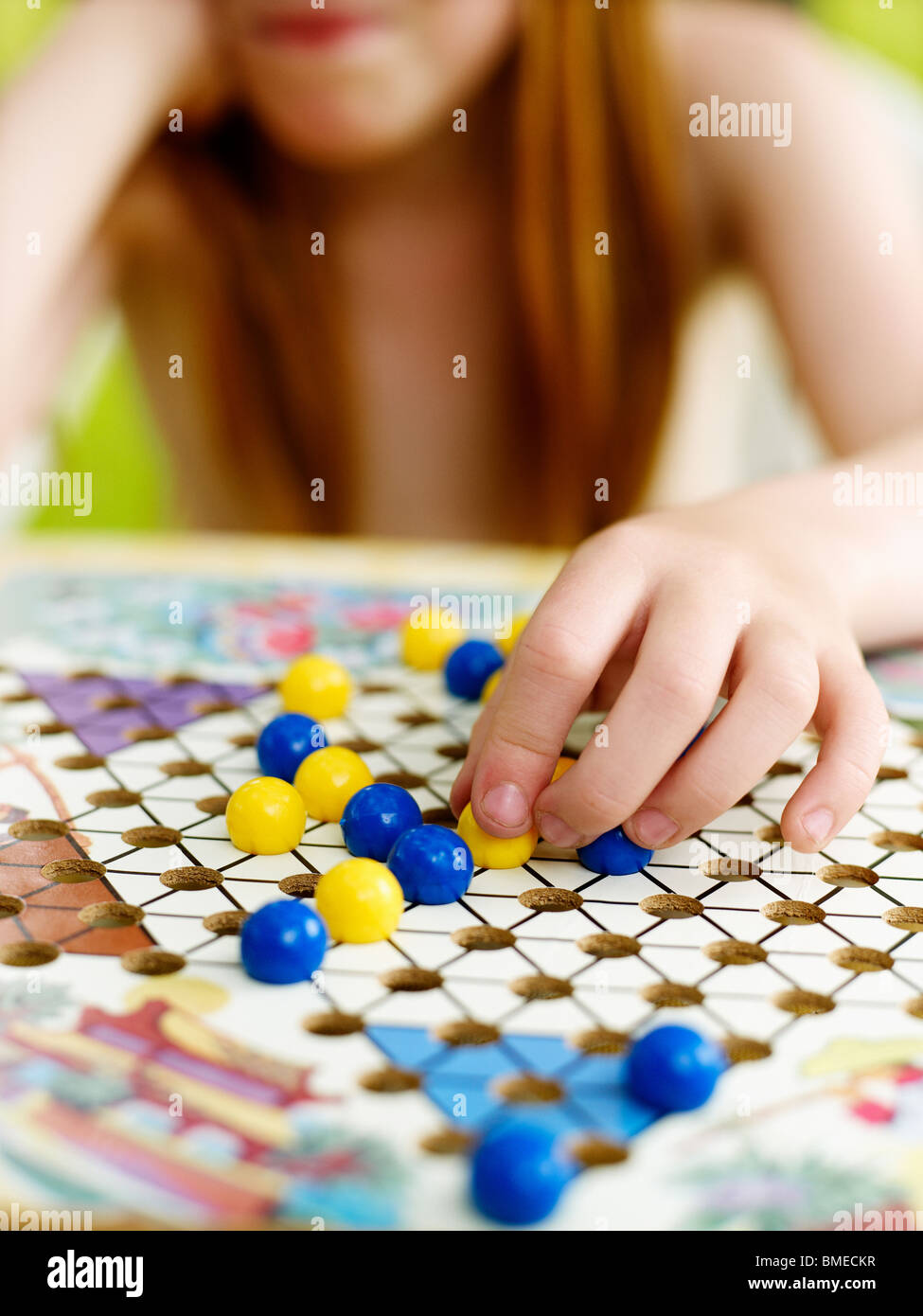 Girl playing game, close-up Stock Photo - Alamy