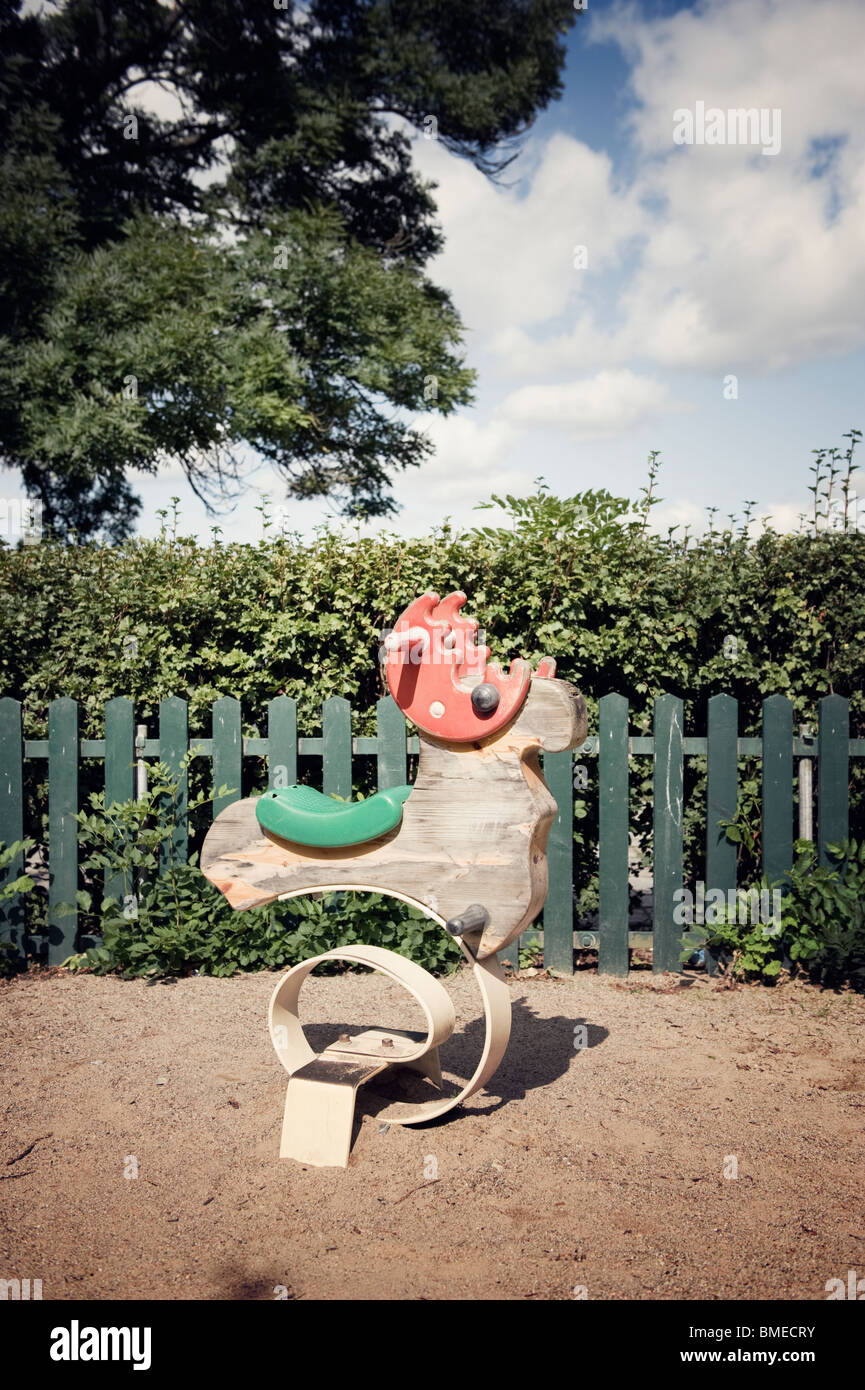 Playground with rocking horse hi-res stock photography and images - Alamy