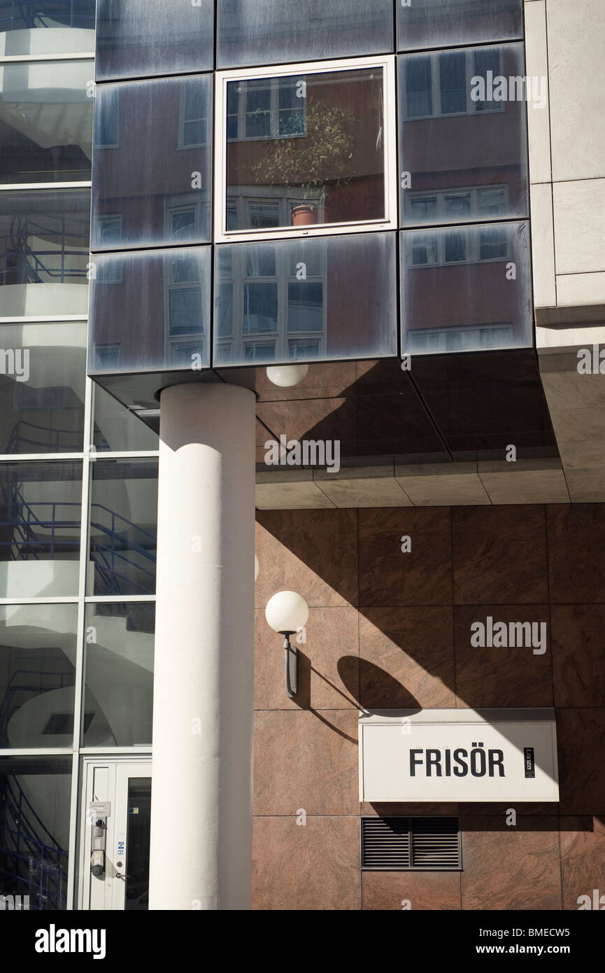 Sign board on building wall Stock Photo - Alamy