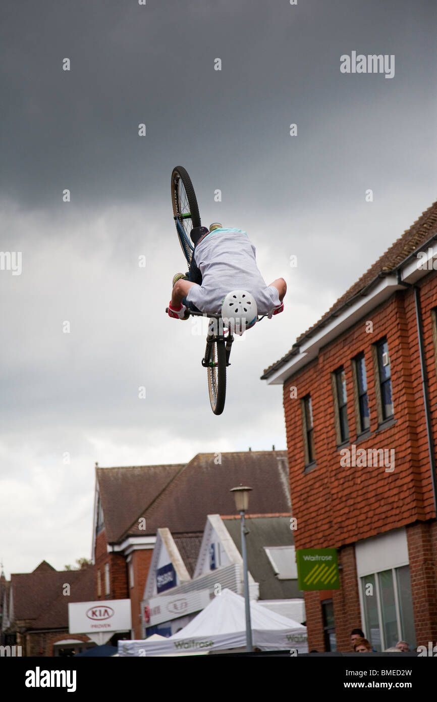 Teenager performing somersault young hi-res stock photography and ...