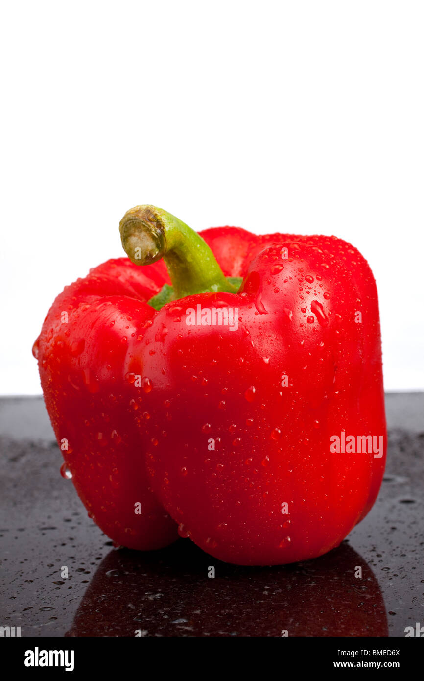 A single red pepper Stock Photo - Alamy