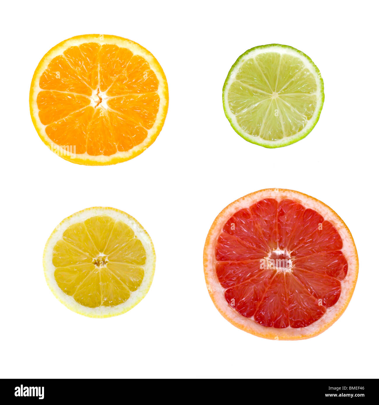 Citrus fruit slices isolated on white background Stock Photo - Alamy