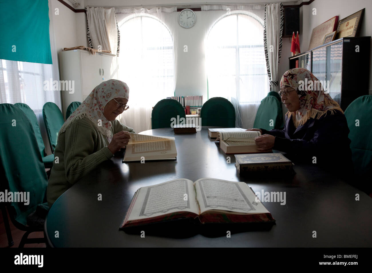 Elderly Muslim women studying Koran in Women's Mosque, Shanghai, China ...