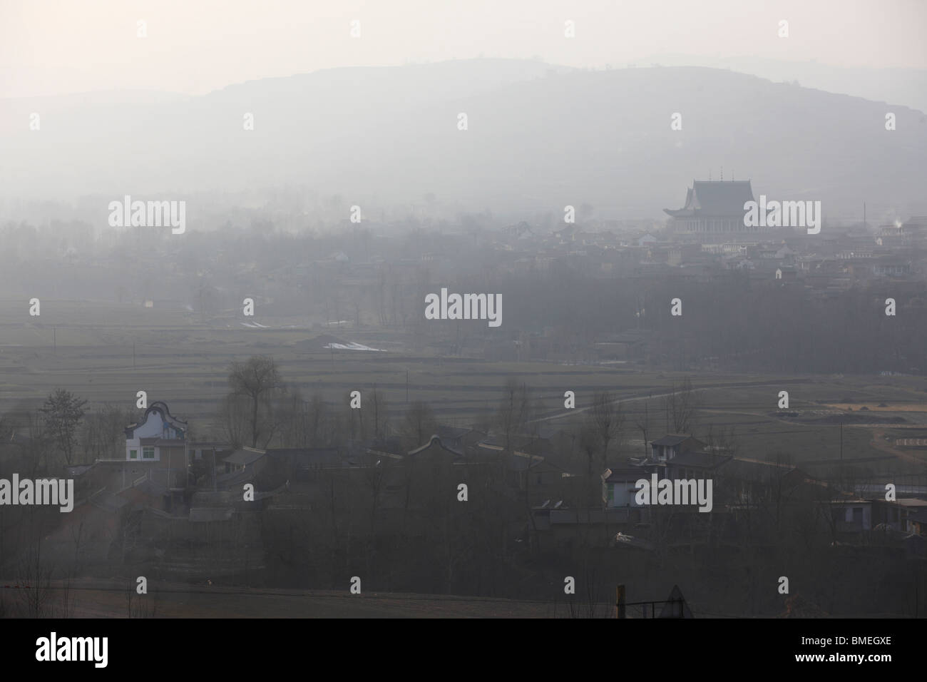 Ethnic Bonan village in mist, Jishishan Bonan Dongxiang and Salar ...
