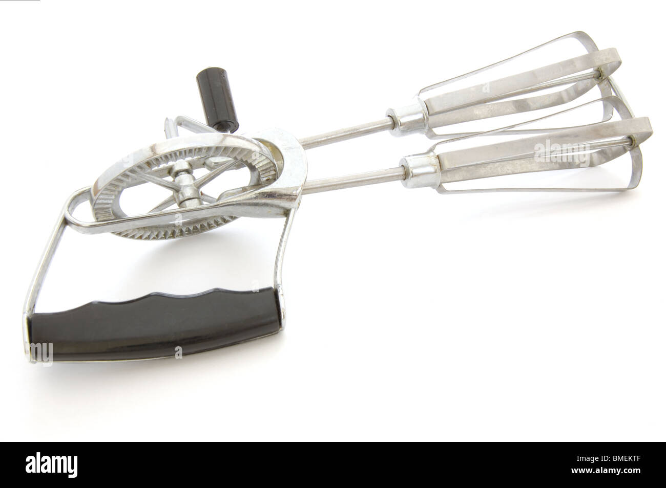 Stainless steel hand whisk isolated on a white background Stock Photo ...