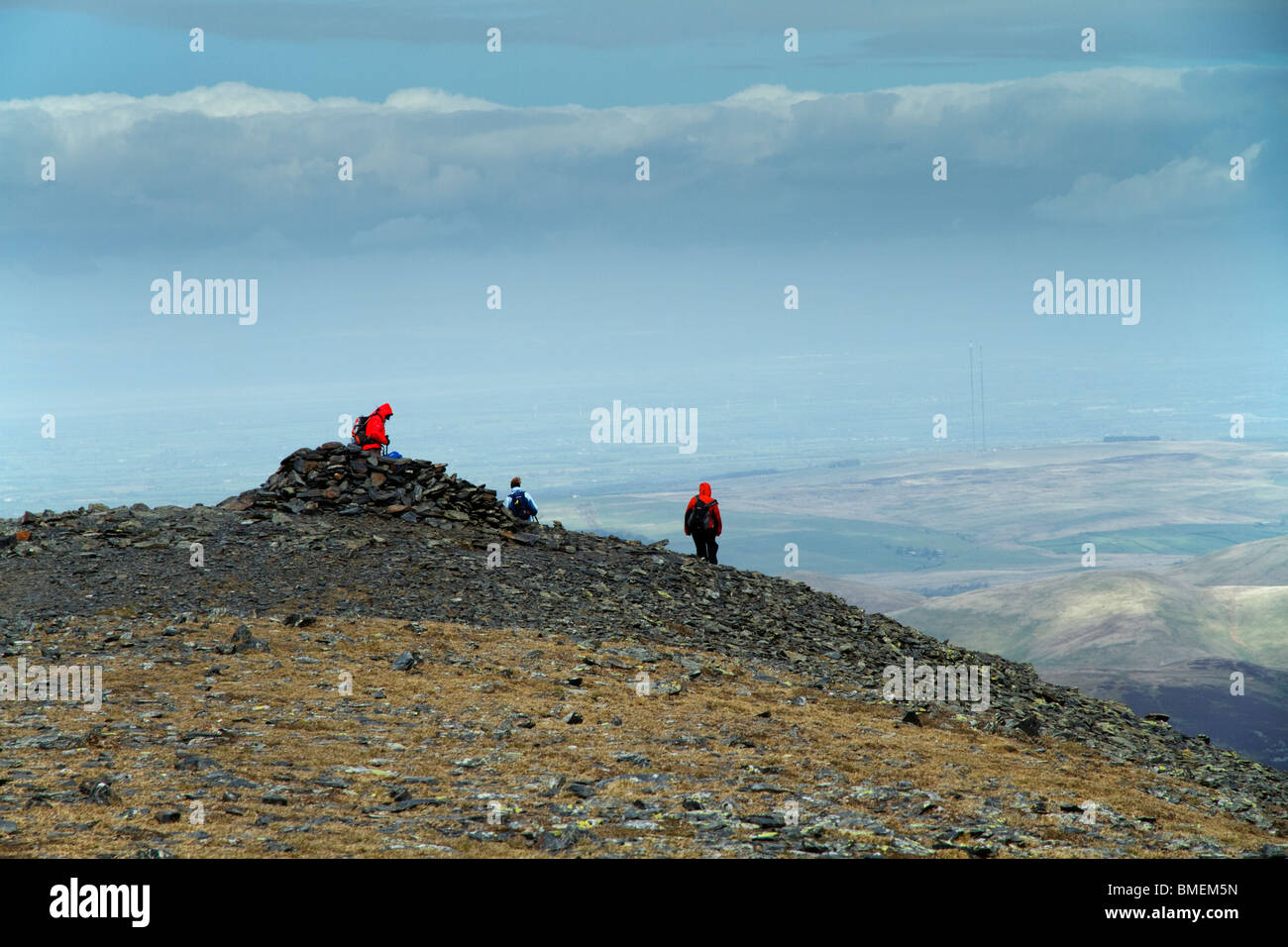 Skiddaw Mountain Summit 931mtrs Hill Walkers On The Summit Sheltering ...