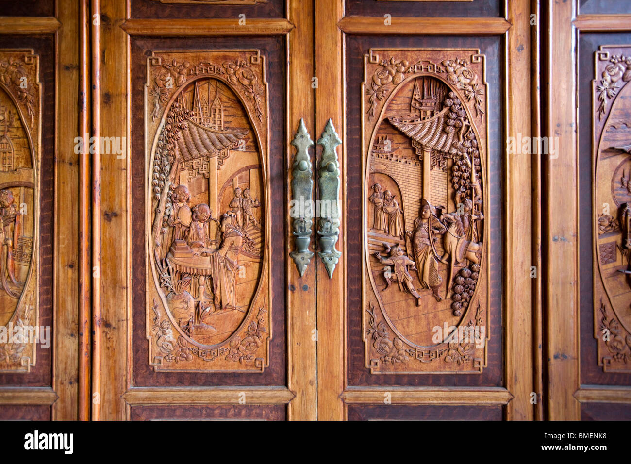 Detail of wooden closet door carved with ancient stories, Lu's ...