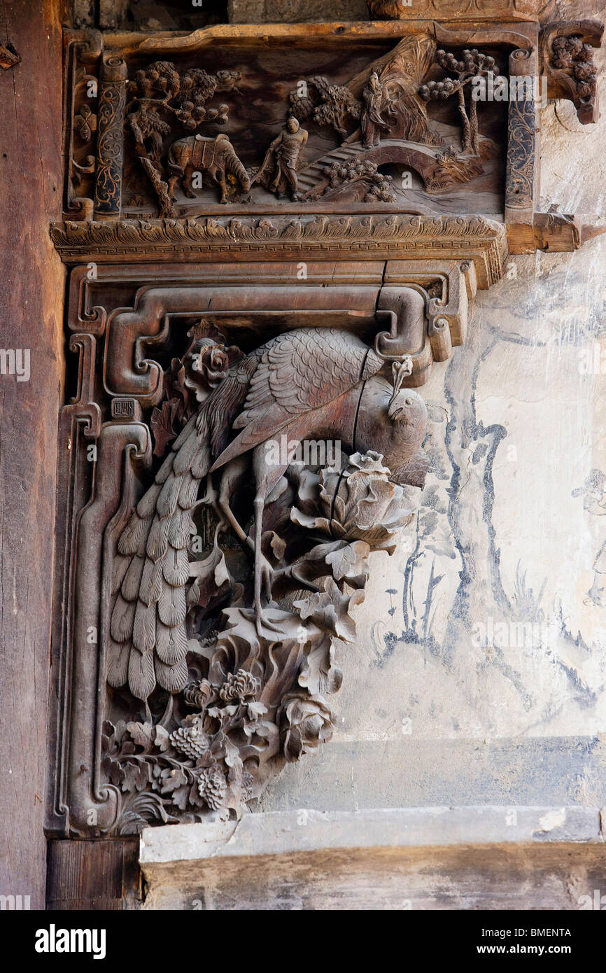 Exquisitely carved wooden beam with phoenix and peony, Lu's Residence ...