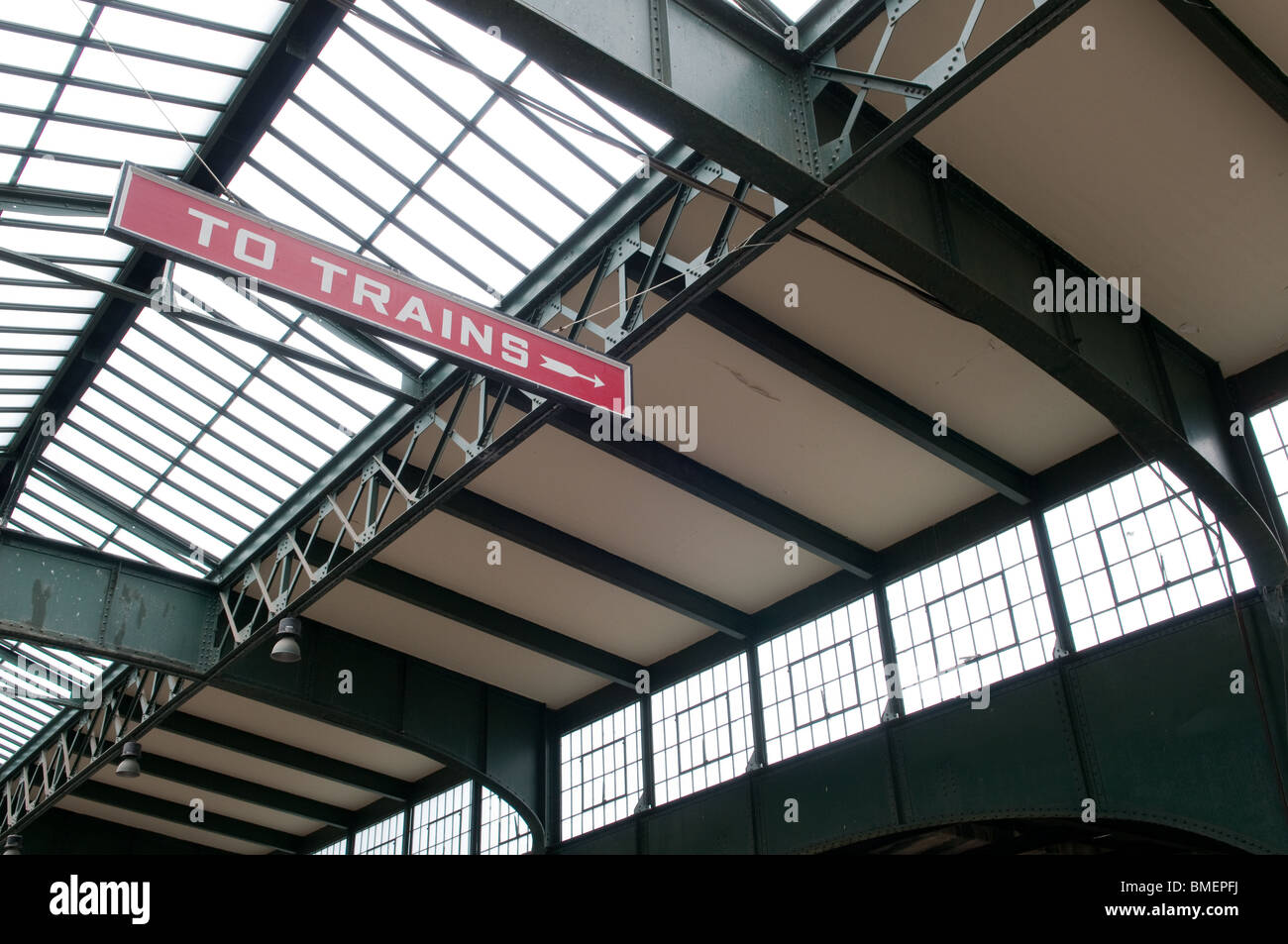 Sign directing travelers to the location of the train platform Stock ...