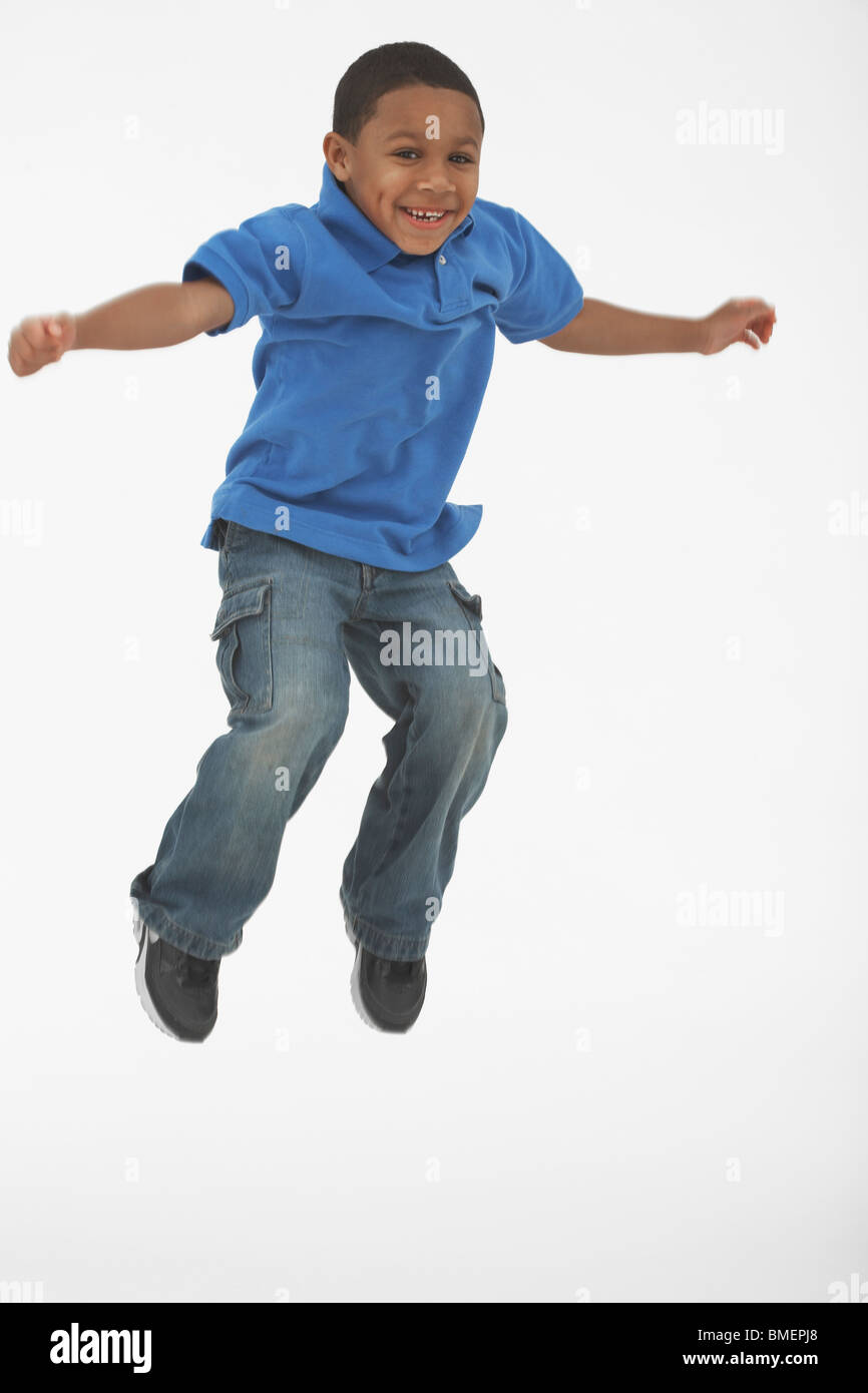 A Boy Jumping Stock Photo - Alamy