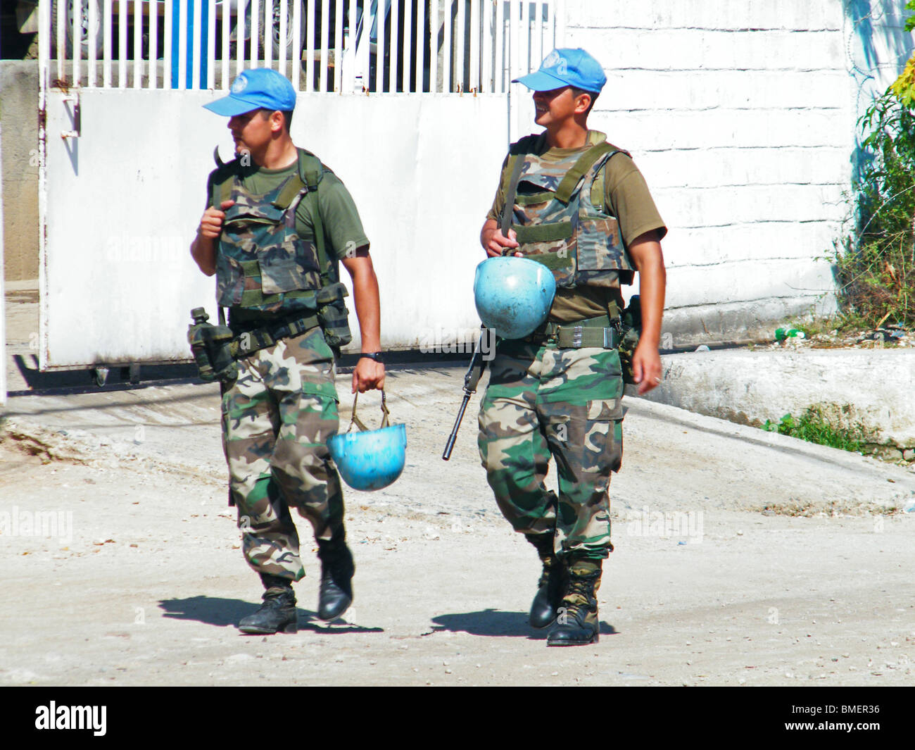 Off duty UN peacekeepers walk through Fort Liberté, Haiti Stock Photo ...