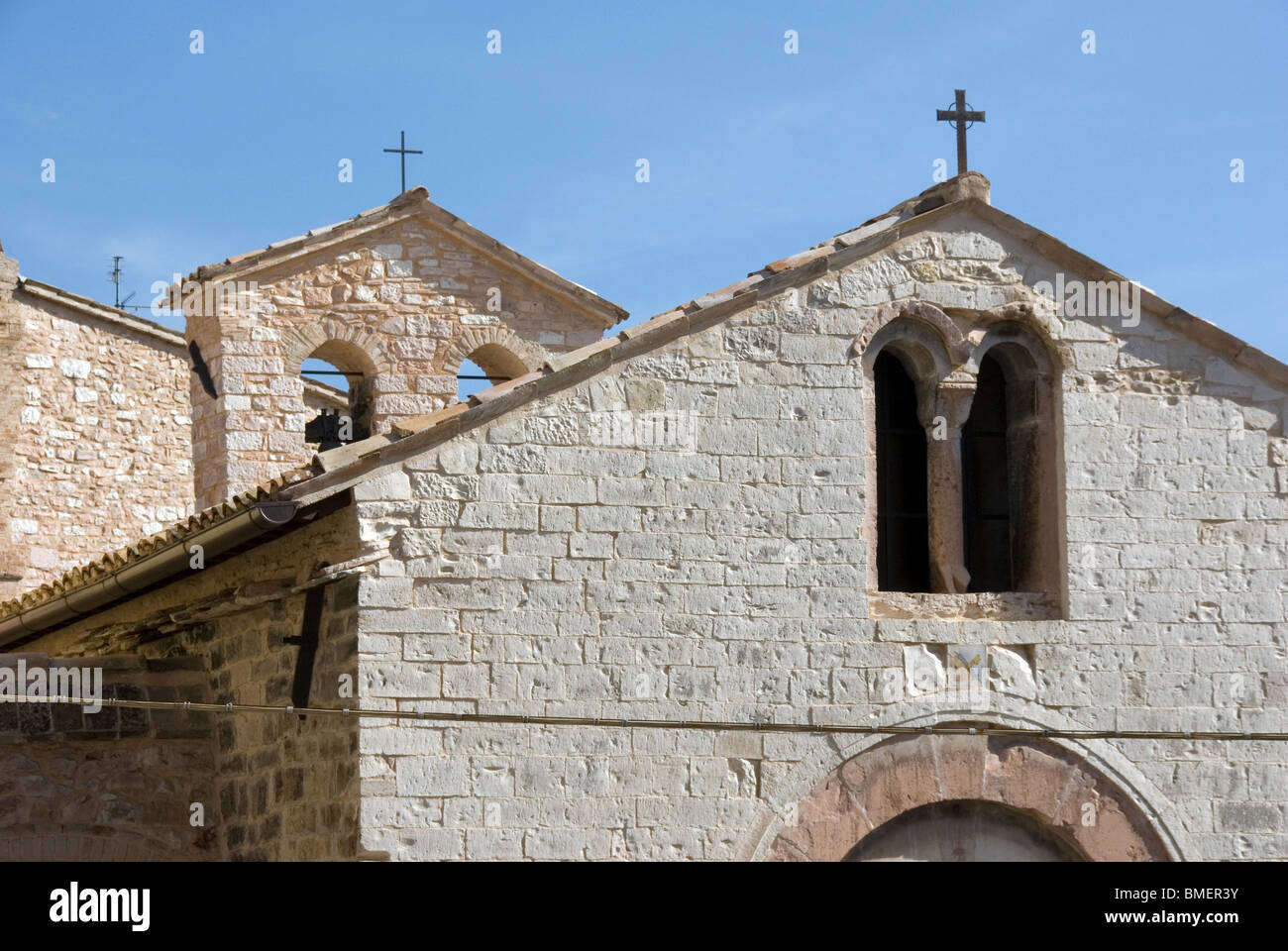 Mullion window and belltower of the ancient church of San Martino in ...