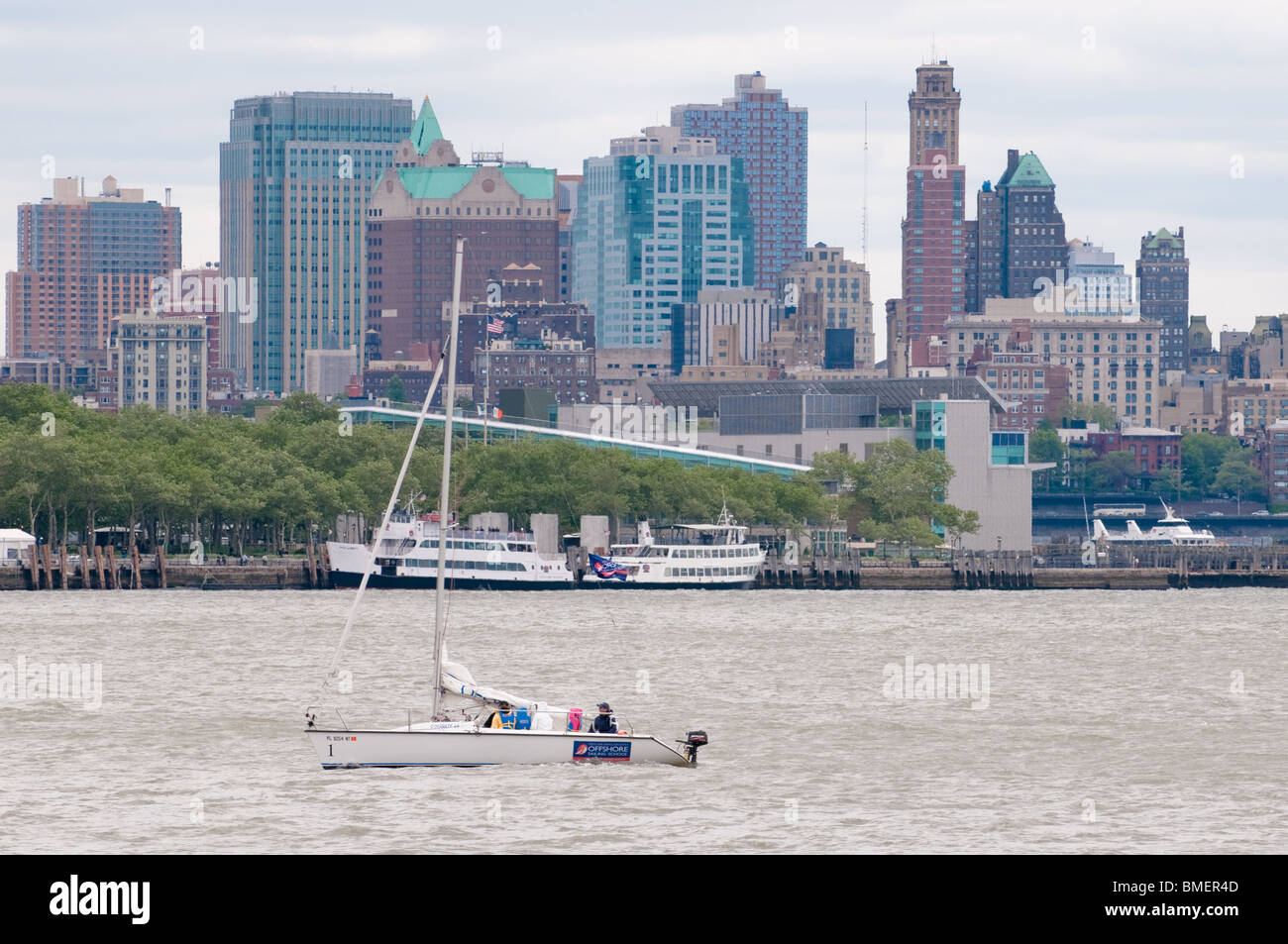 Sailing vessel on the Hudson river with New York City skyline in ...