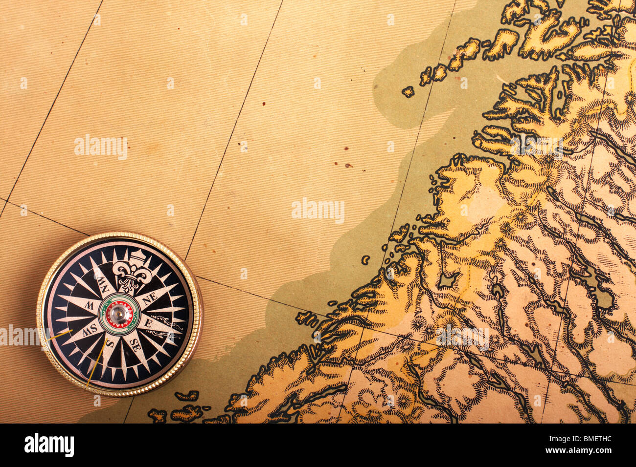Compass on the ancient map Stock Photo - Alamy