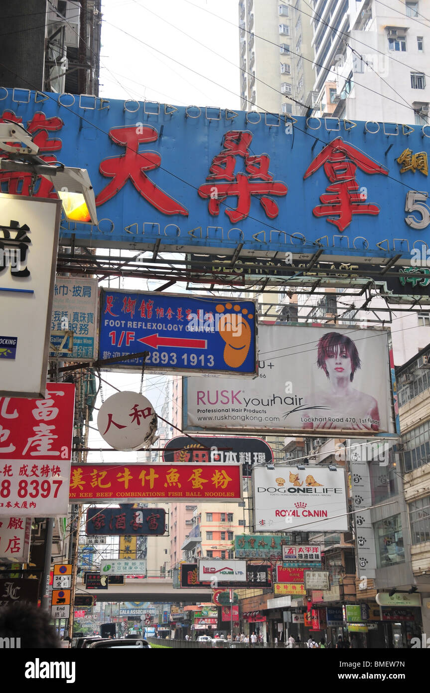 Day-time shot of many Chinese neon signs above Lockhart Road, Wan Chai ...