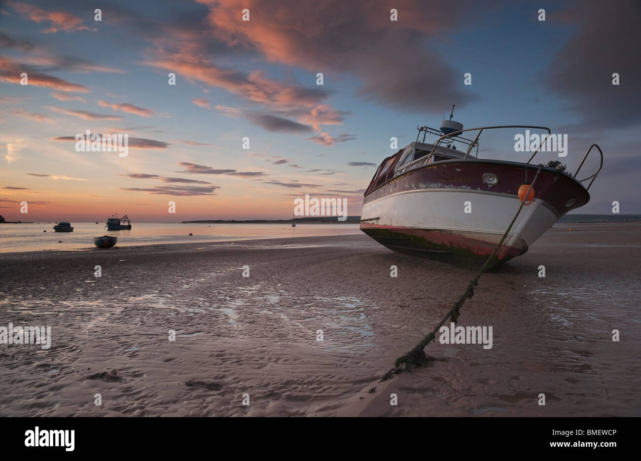 Boats at Instow beach at sunset Stock Photo - Alamy