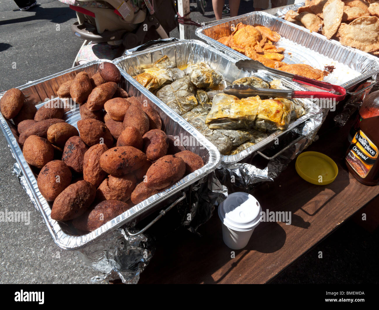 trays of Colombian food including empanadas & string tied tamales at ...