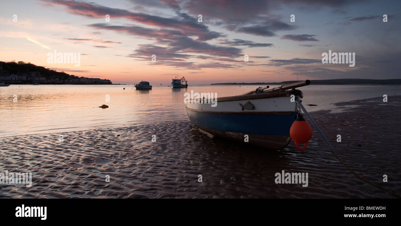 Boats at Instow beach at sunset Stock Photo - Alamy