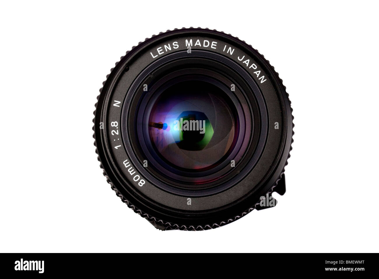 Close-up of a vintage 80mm camera lens made in Japan on white ...
