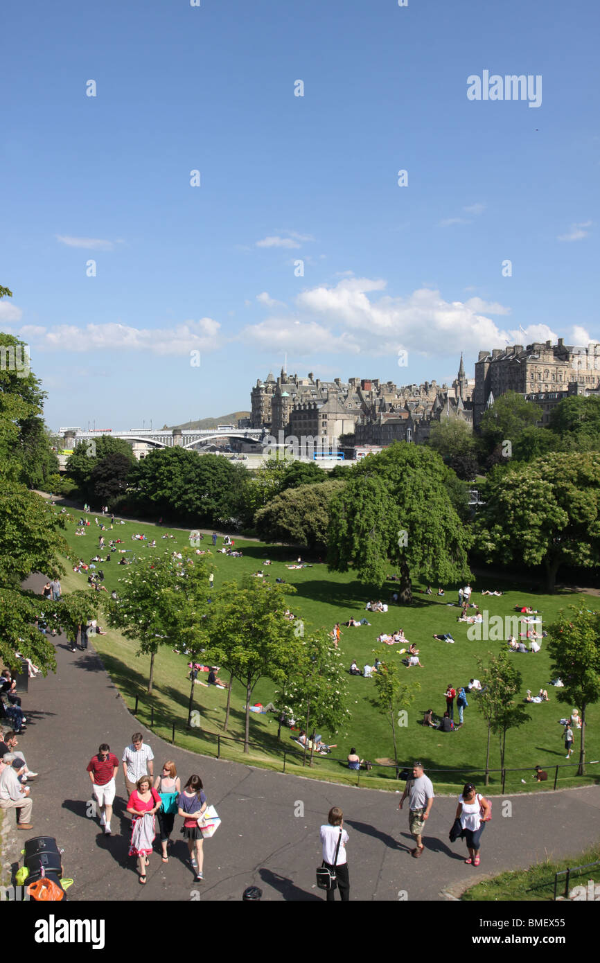 people enjoying a summer's day in Princes gardens Edinburgh Scotland ...