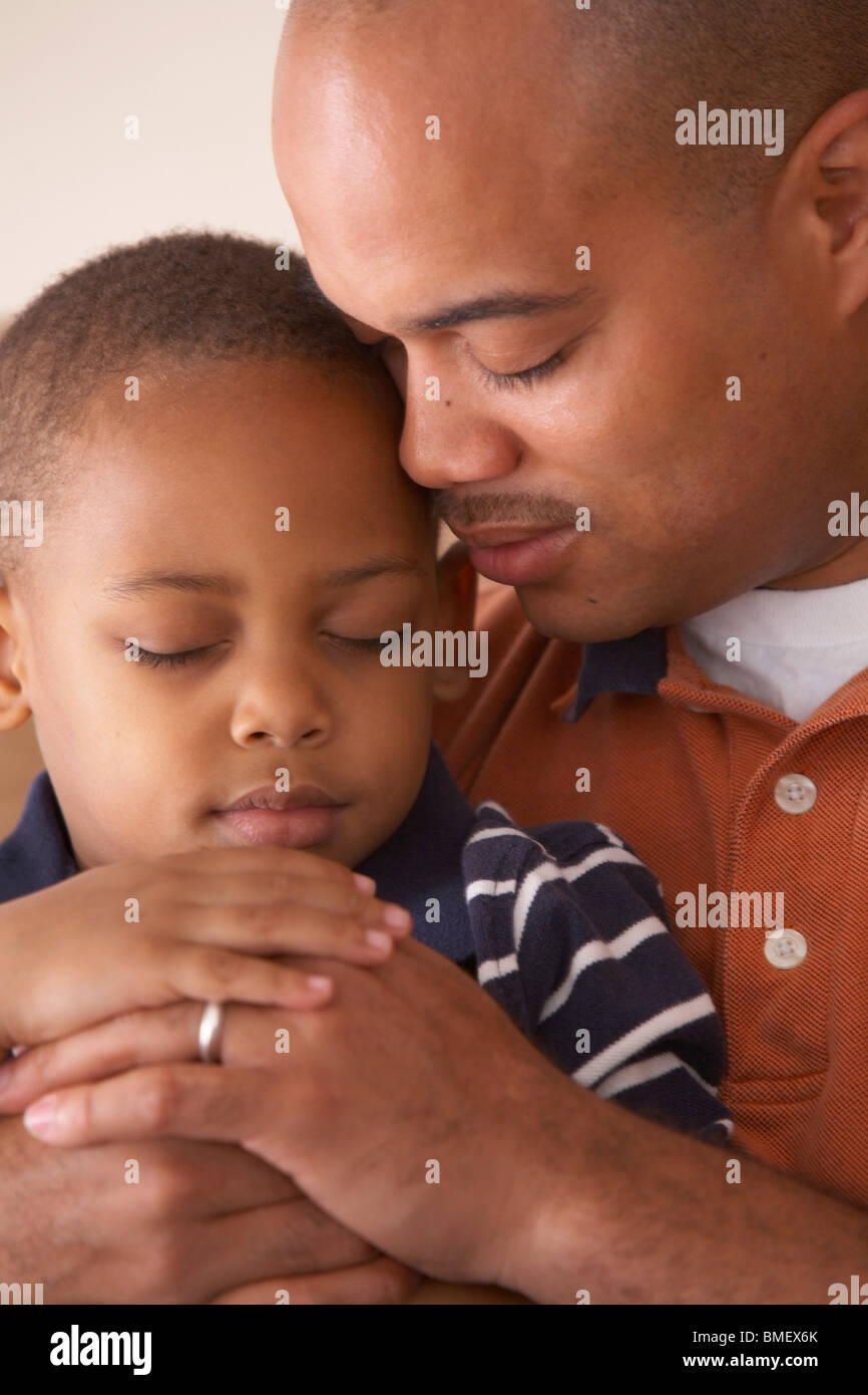 Father praying sons hi-res stock photography and images - Alamy