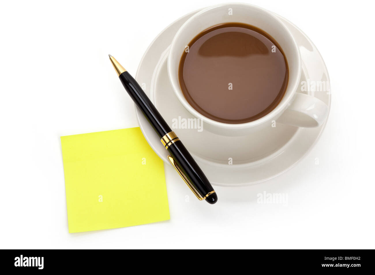 Coffee cup and note pad close up Stock Photo - Alamy