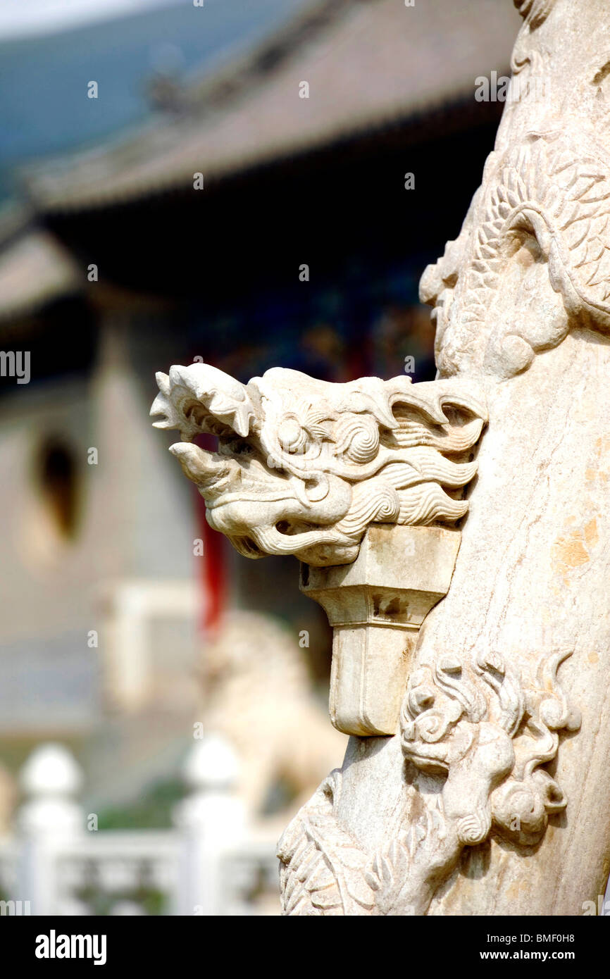 Close-up of mythical animal carving on Pailou, Longquan Temple, Mount ...