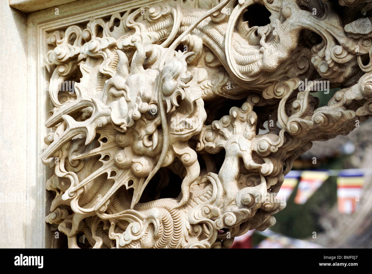 Close-up of exquisite patterns carving on Pailou, Longquan Temple ...