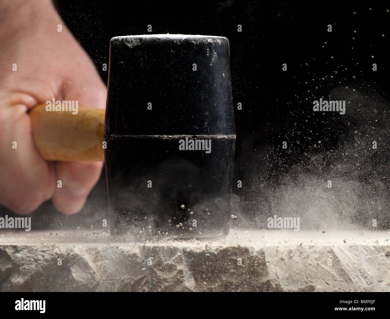 Hammer breaking rock hi-res stock photography and images - Alamy
