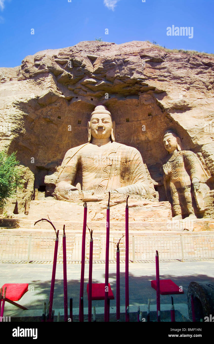 Giant statues of Shakyamuni and disciple, Yungang Grottoes, Datong City ...