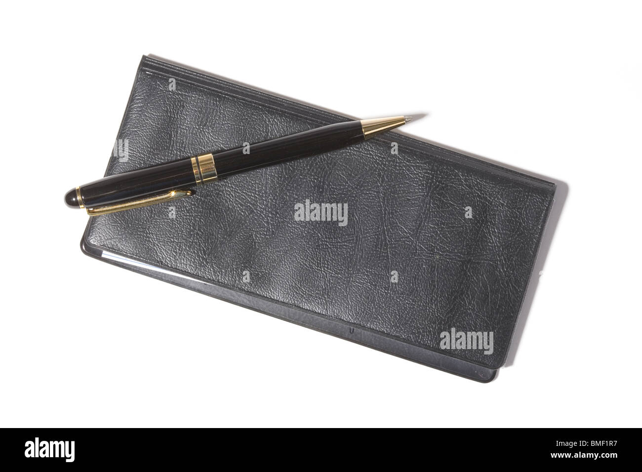 Checkbook and pen with white background Stock Photo - Alamy