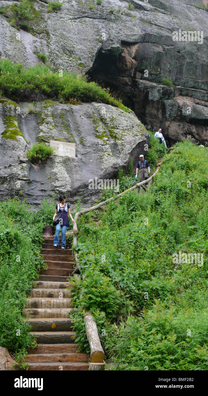 People visiting the former site of Gaxian Cave, Gaxian Cave Forest Park ...