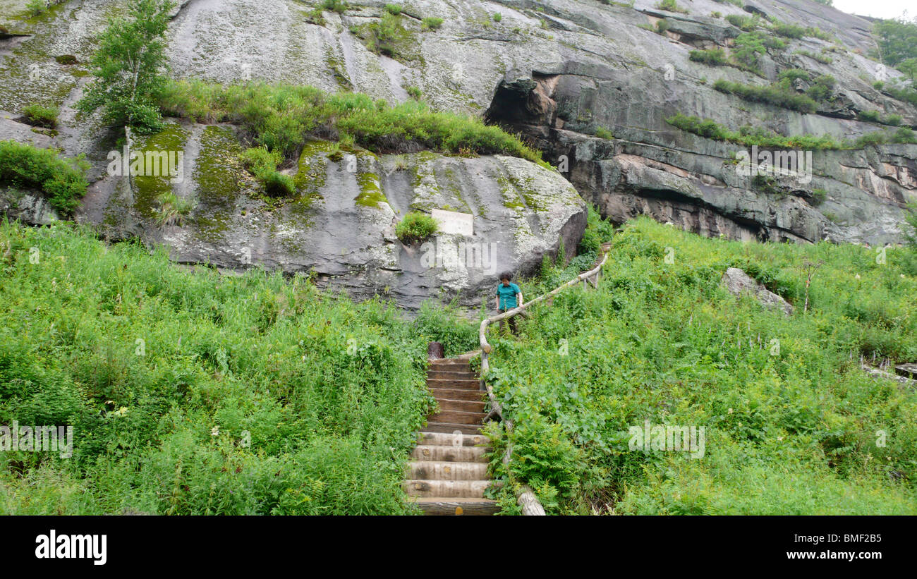 Woman visiting the former site of Gaxian Cave, Gaxian Cave Forest Park ...