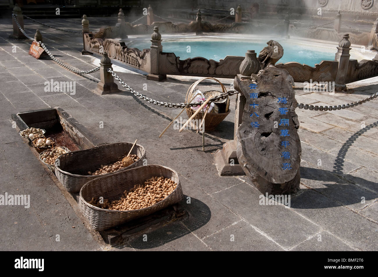Hot spring boiled eggs and peanuts sold beside Big Boiling Pot, Rehai ...