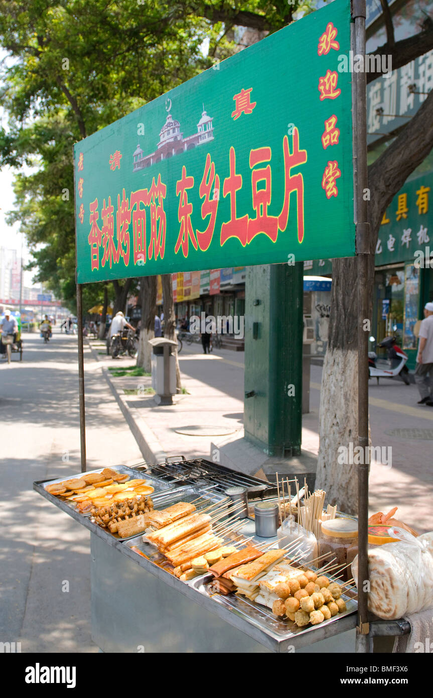 A streetside snack stall, Lanzhou, Gansu Province, China Stock Photo ...