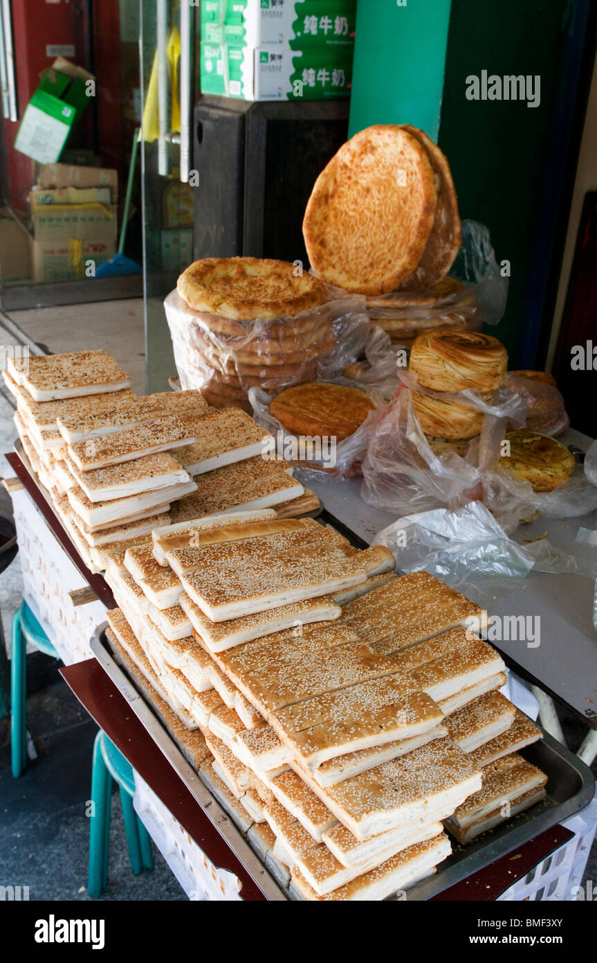 Traditional Islamic bread Nang sold in a street stall, Lanzhou, Gansu ...