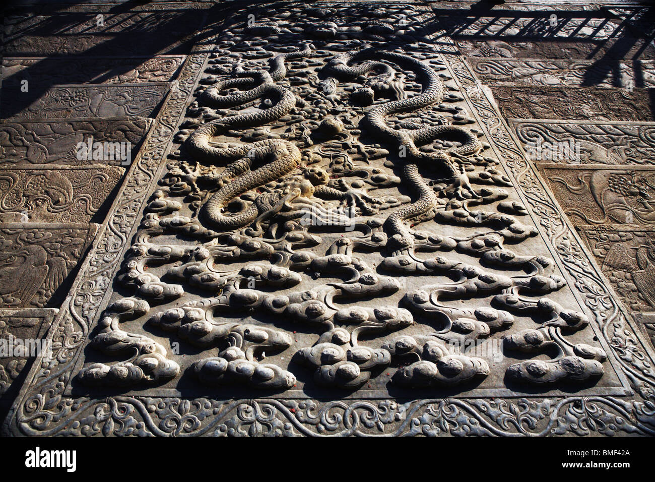 Raised marble platform behind Hall of Preserving Harmony carved with ...