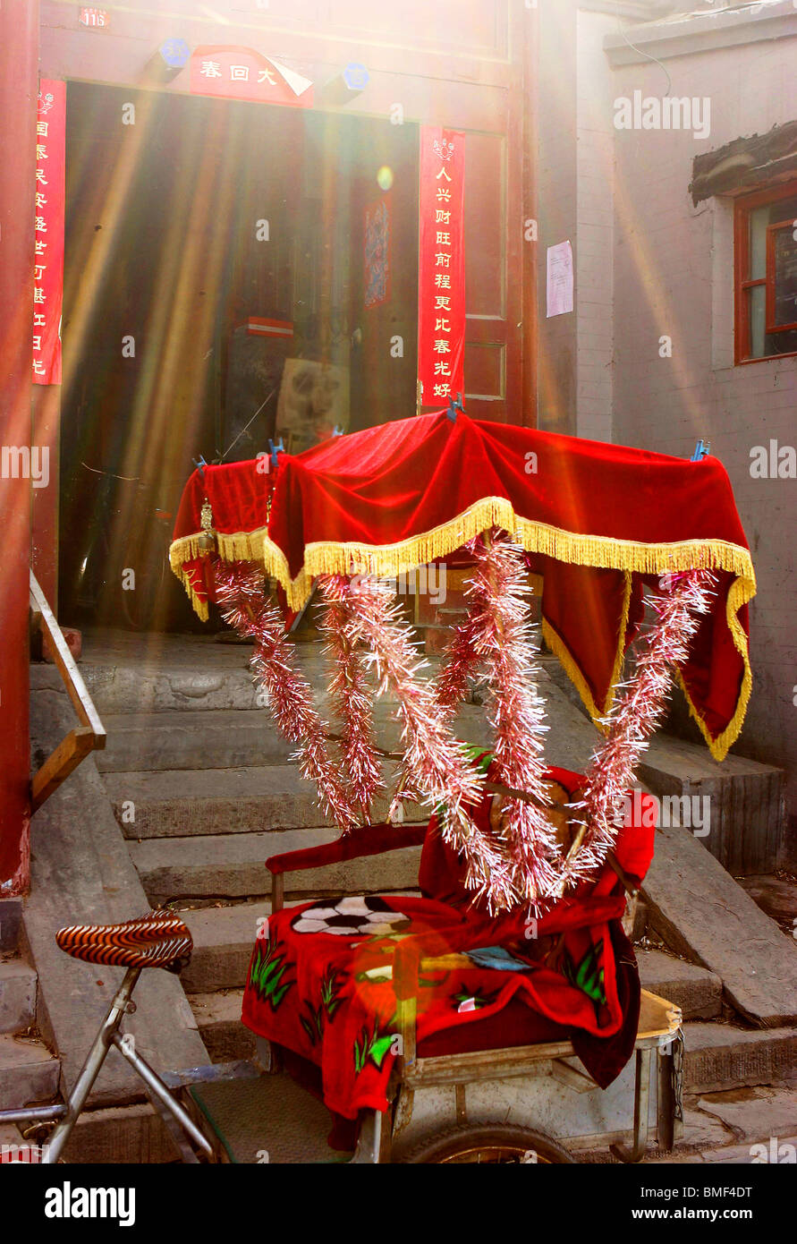 Decorated rickshaw in sunlight, Beijing, China Stock Photo - Alamy
