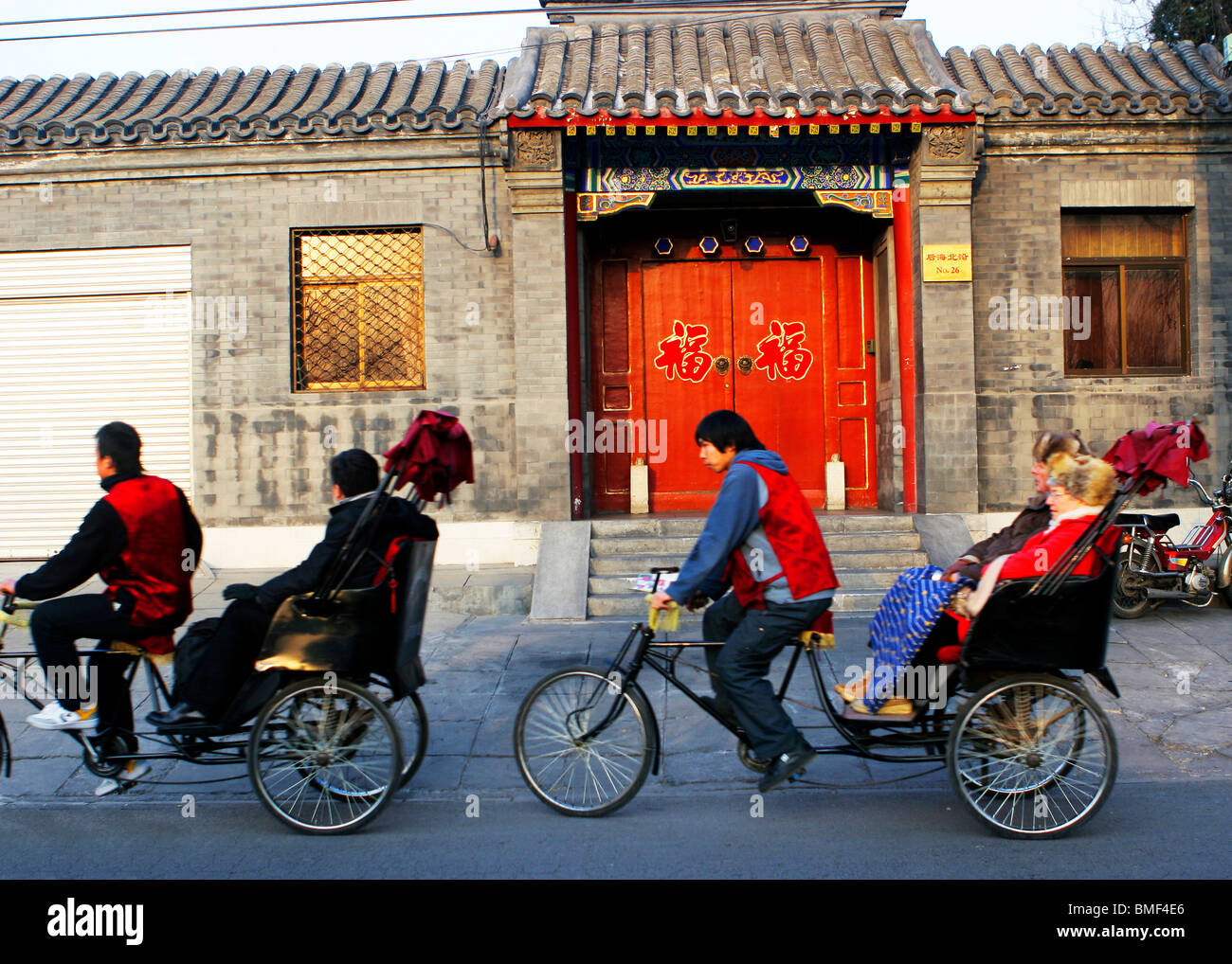 Rickshaw drivers take tourists for Hutong tour, Beijing, China Stock ...