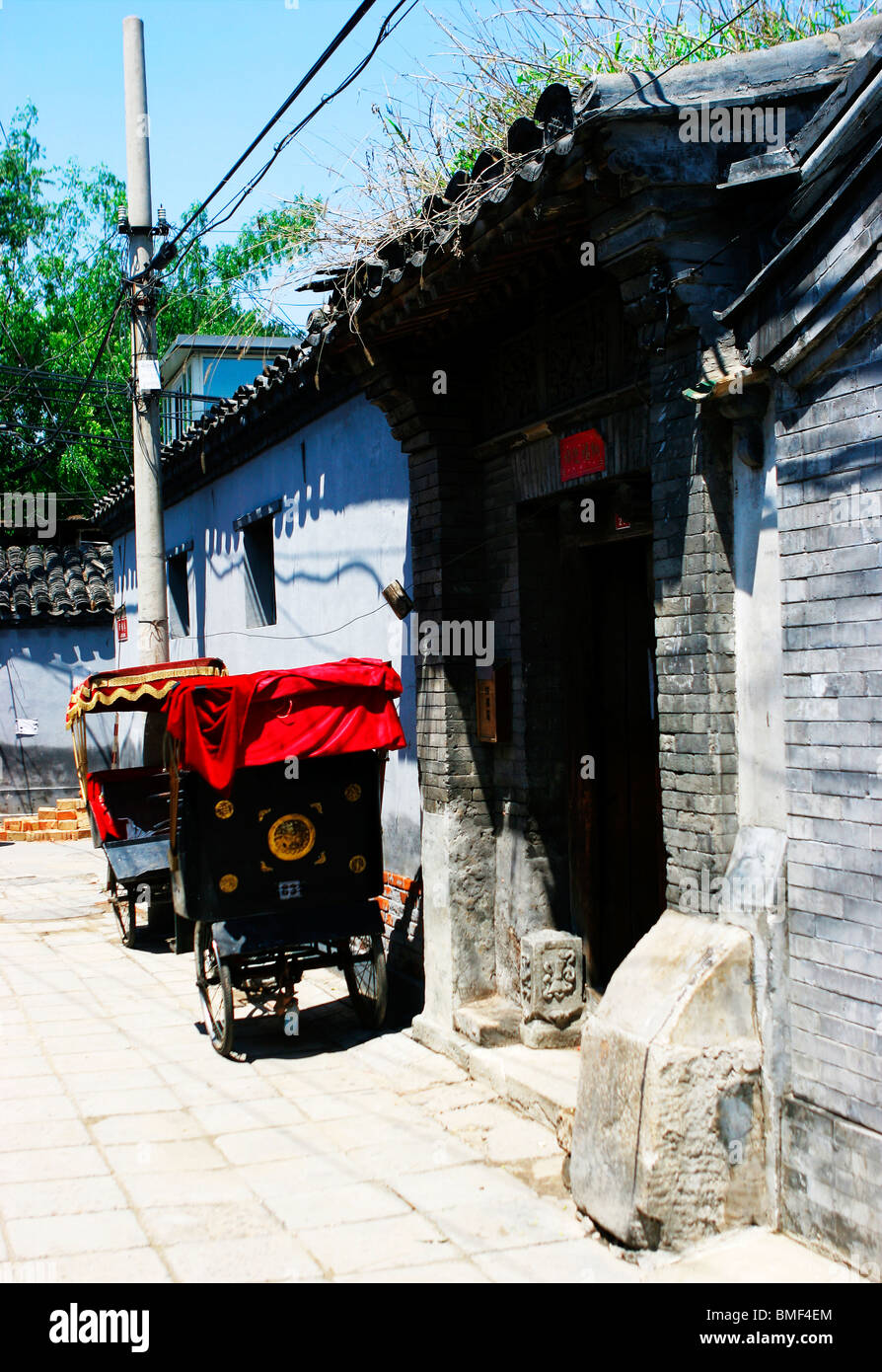 Rickshaws parking beside the Hutong courtyard house, Beijing, China ...