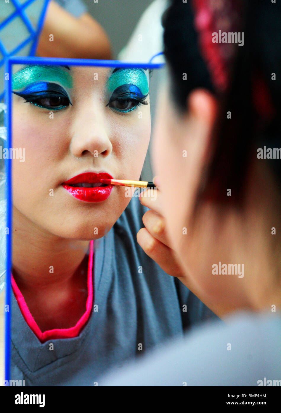 Female Beijing opera performer making up, Beijing, China Stock Photo ...