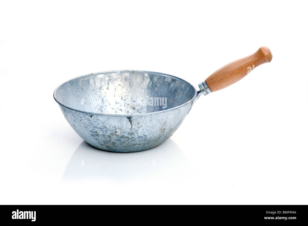 Galvanized steel, traditional animal feed pan. Isolated on a white ...