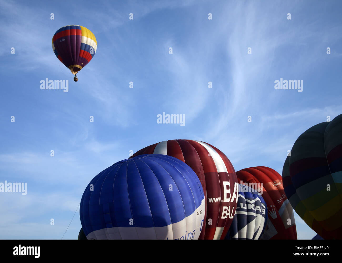 Hot air balloons mass launch Stock Photo - Alamy