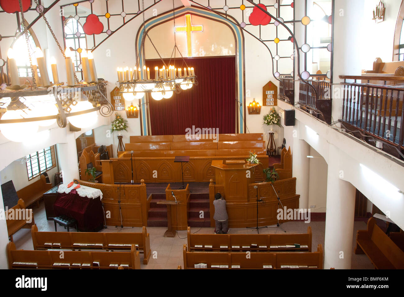 Woman praying in Shanghai Huizhong Christian Church, Shanghai, China ...